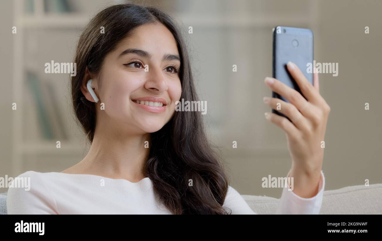 Beautiful arabian middle eastern girl teen wears wireless headphones ...
