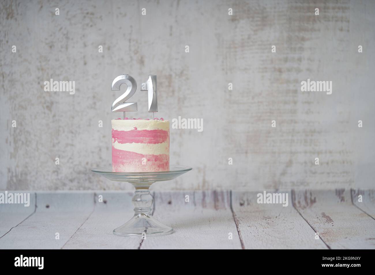 21st Birthday cake pink and silver cake with some sprinkles and 21st ...