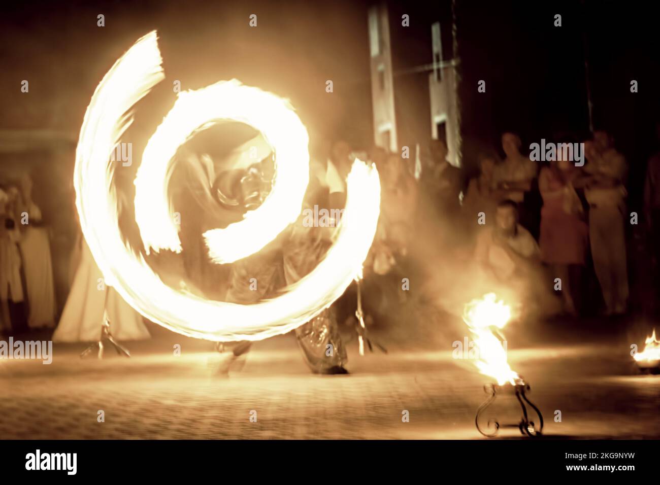 fire show figures, night representation, bright circles Stock Photo - Alamy
