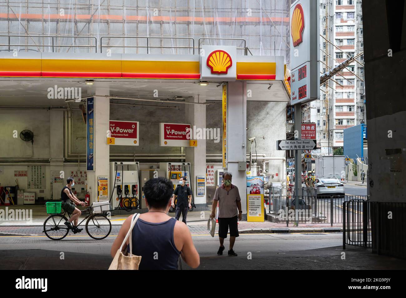 Hong Kong, China. 22nd Oct, 2022. Pedestrians walk past the global ...