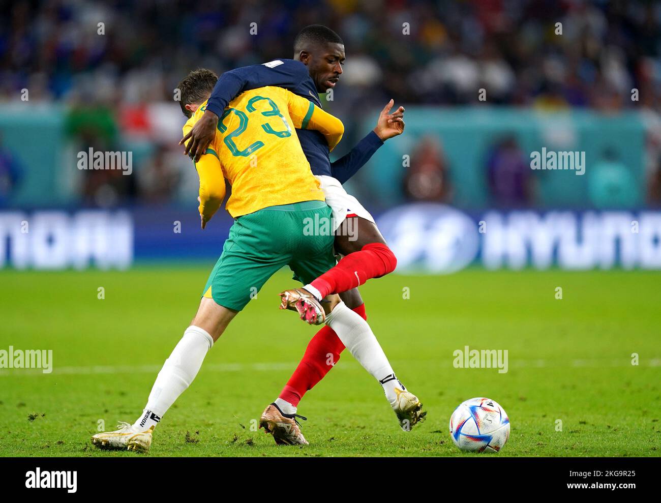 France's Ousmane Dembele (right) and Australia's Craig Goodwin battle ...