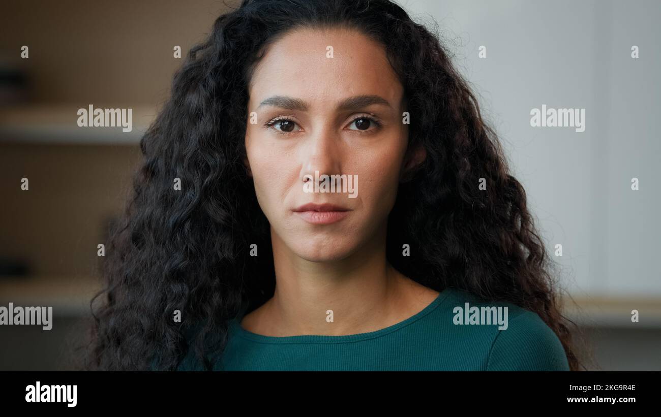 Sad depressed woman arab hispanic upset wife stand alone in kitchen ...