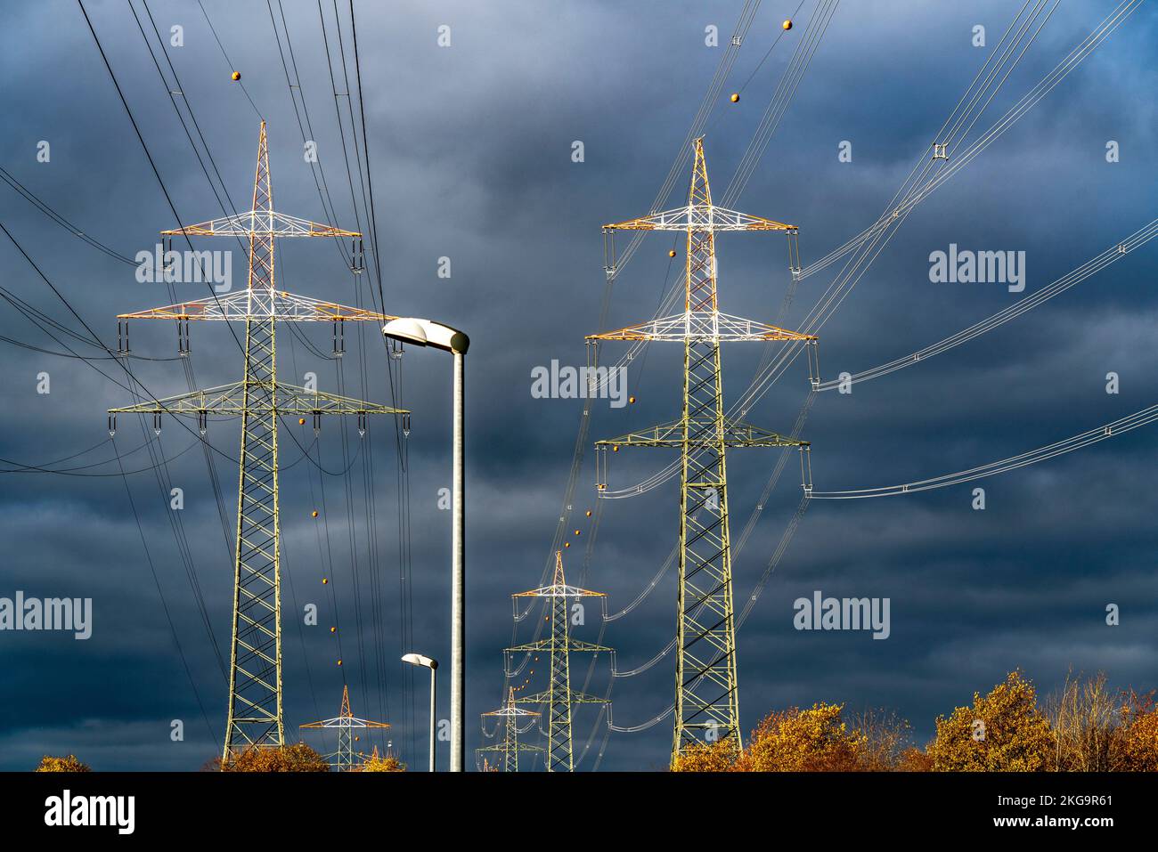 High voltage pylons, overhead lines, with warning coating for air ...