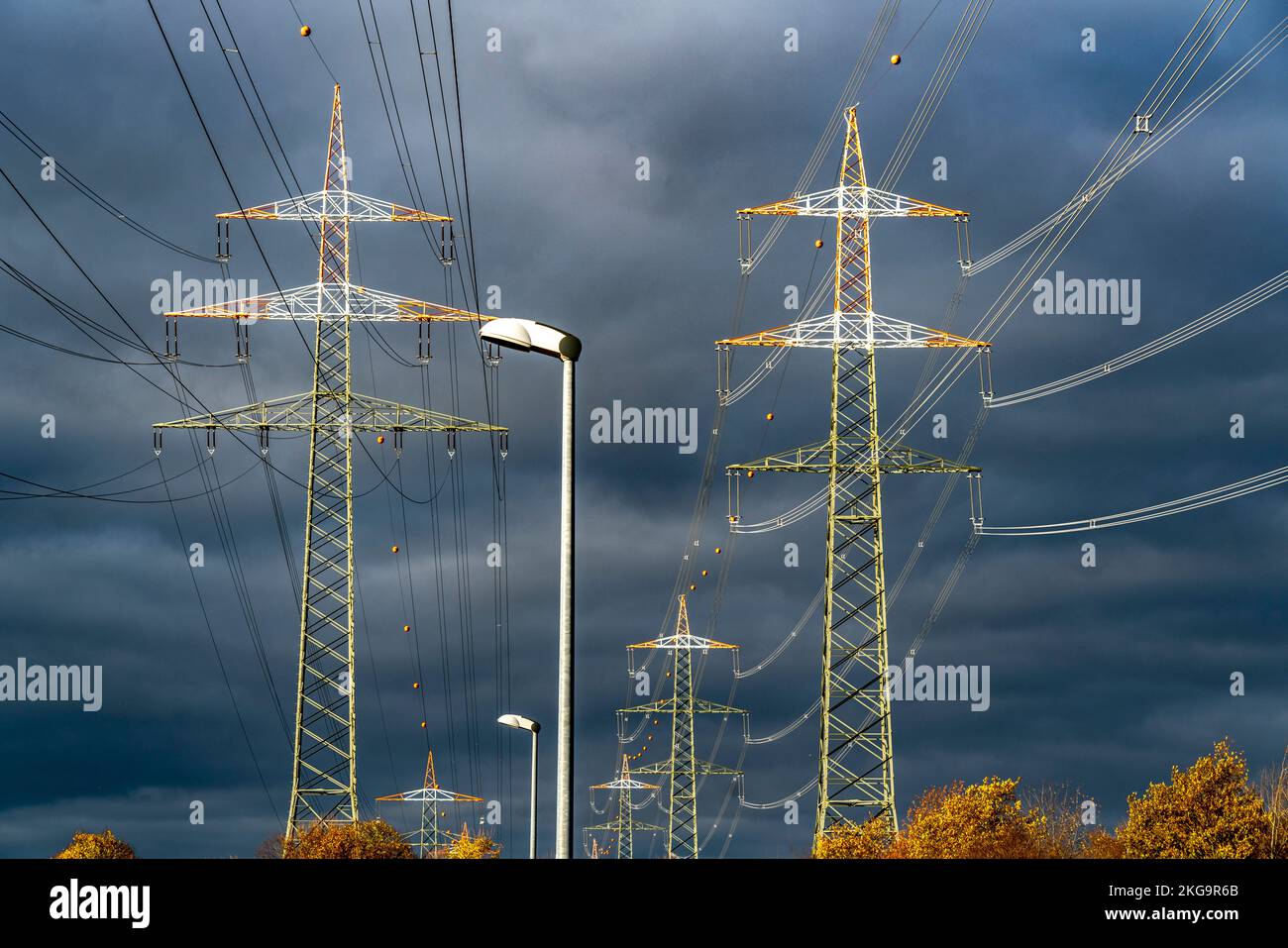 High voltage pylons, overhead lines, with warning coating for air ...