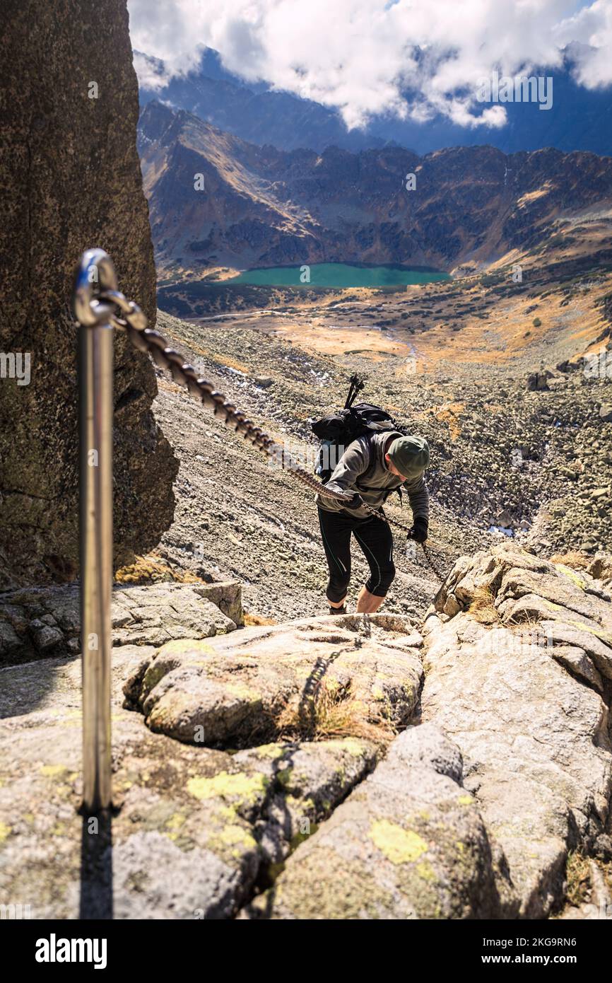 Tourist on rocks, valley of five lakes Stock Photo - Alamy