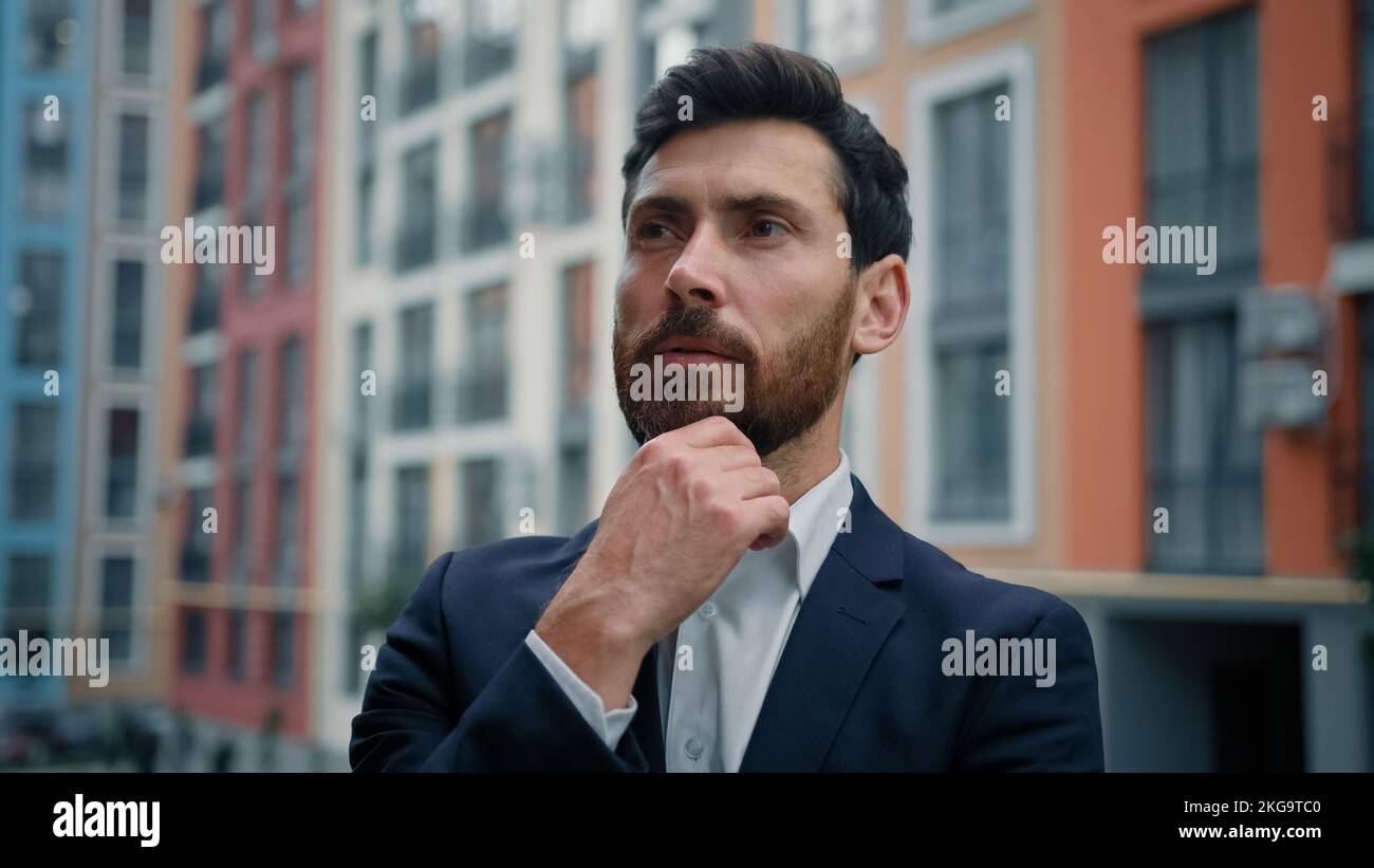 Caucasian male thoughtful businessman concentrated think of solution ...