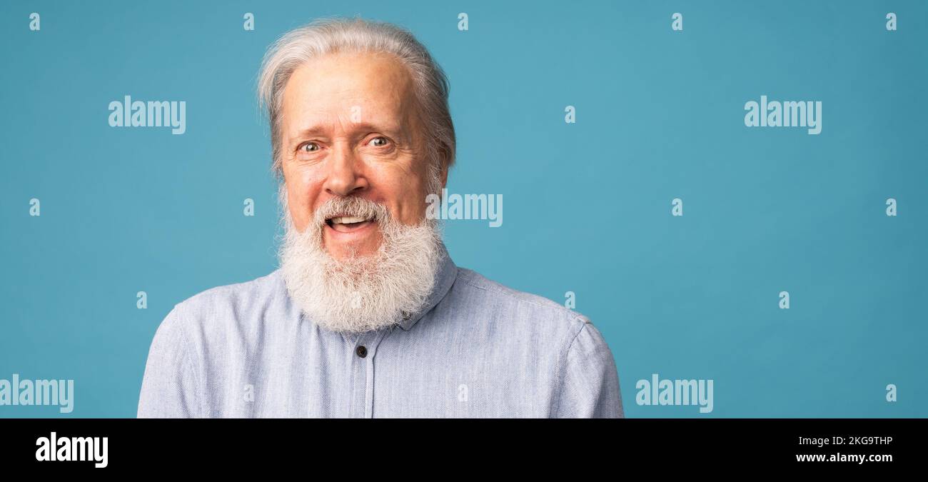 Banner portrait of surprised grey hair beard grandfather old man over ...