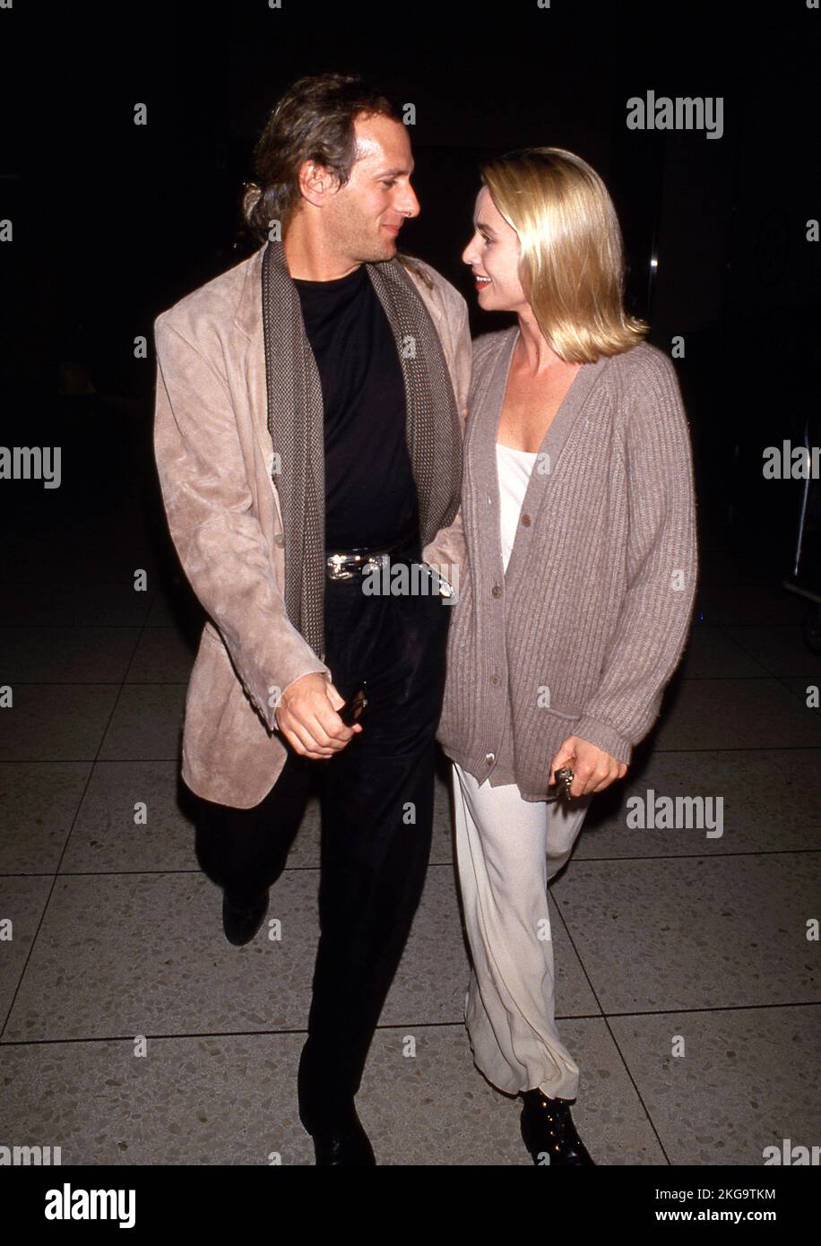 Michael Bolton and Nicollette Sheridan at LAX September 1993 Credit ...