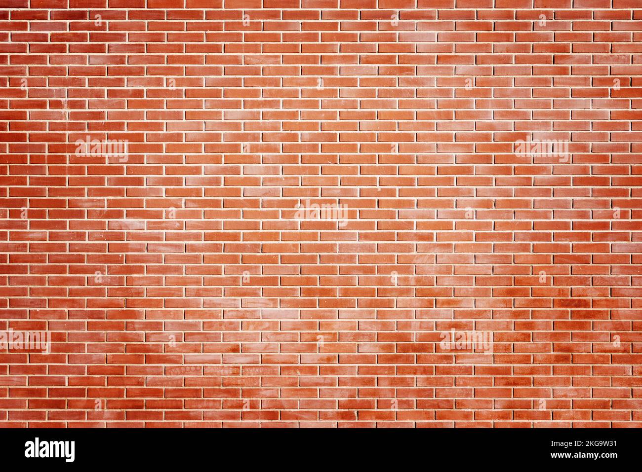 Red brick wall background inside of the room Stock Photo - Alamy
