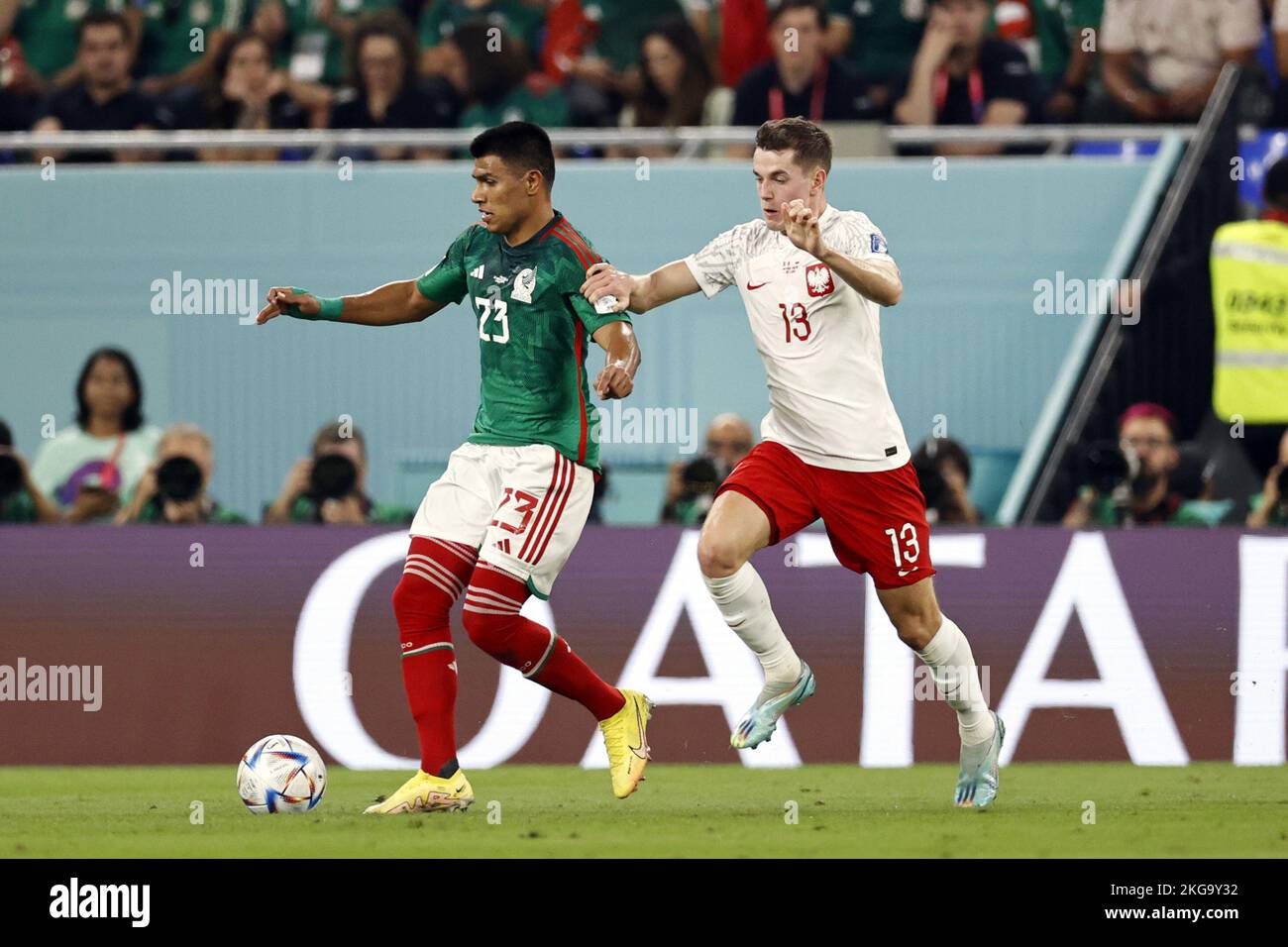 DOHA - Qatar, 22/11/2022, (LR) Jesus Gallardo of Mexico, Jakub Kaminski ...