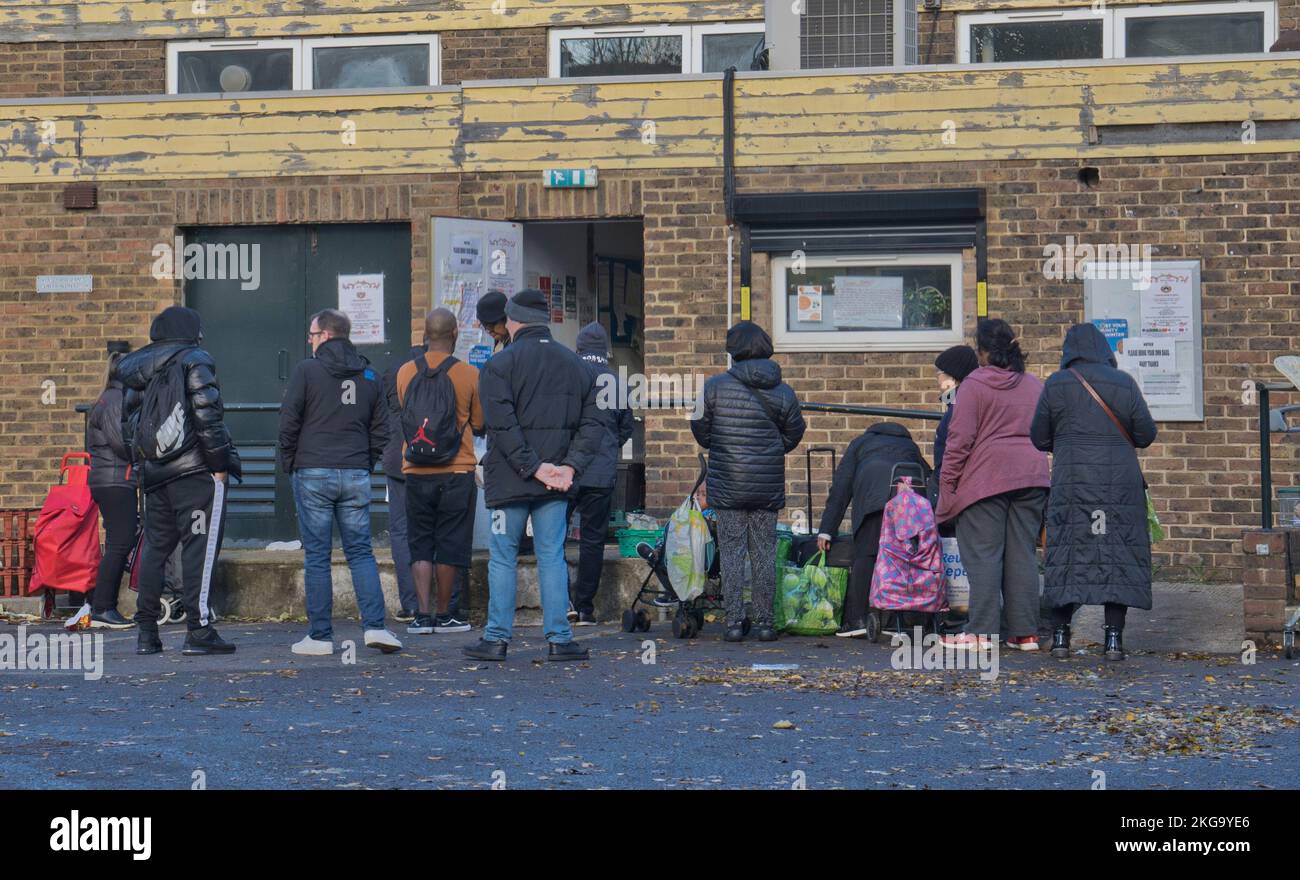 People in line at a foodbank in a community centre in Newham,London ...