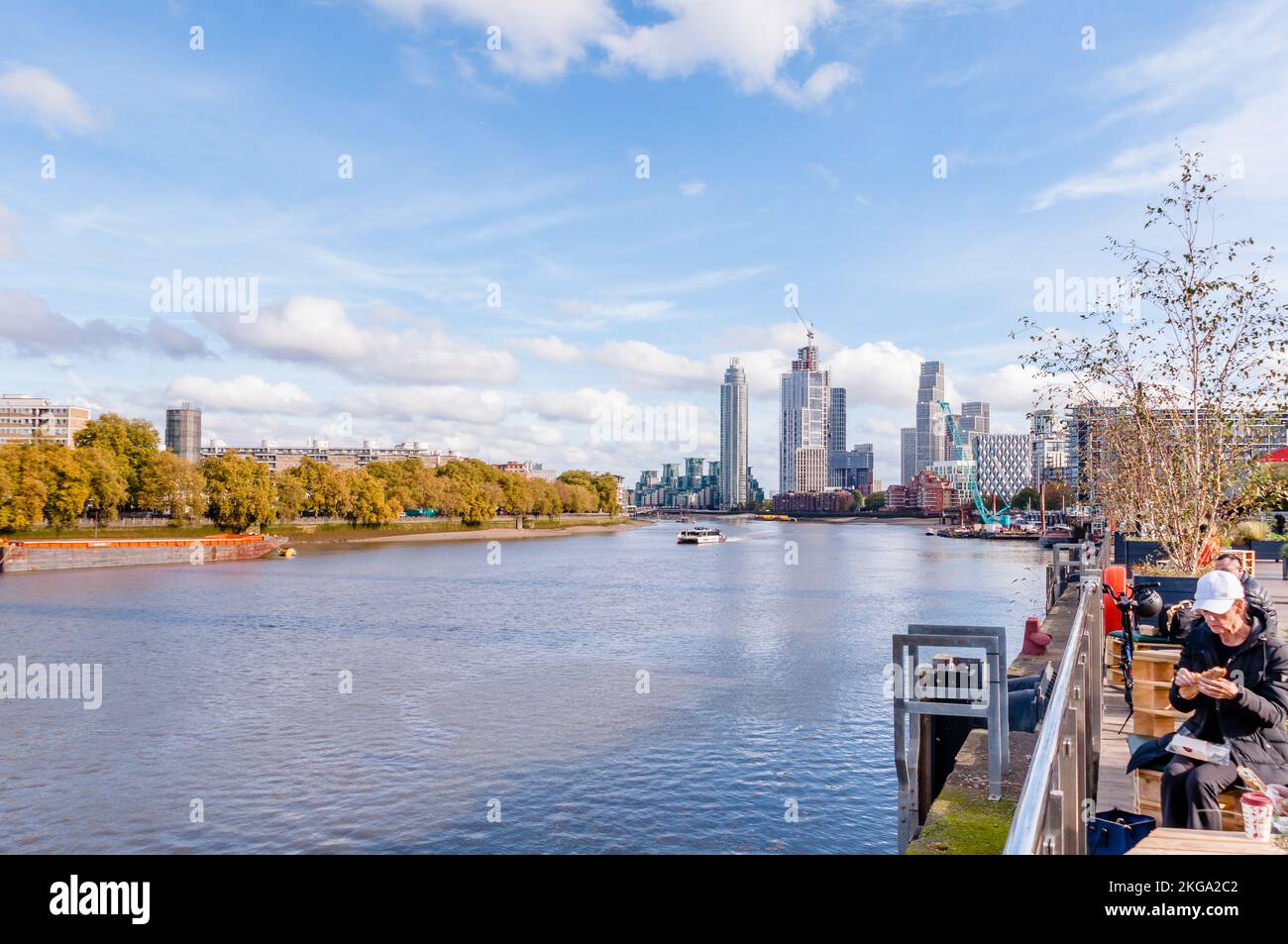 people enjoying the sunshine on the coaling jetty ,a grade II listed ...