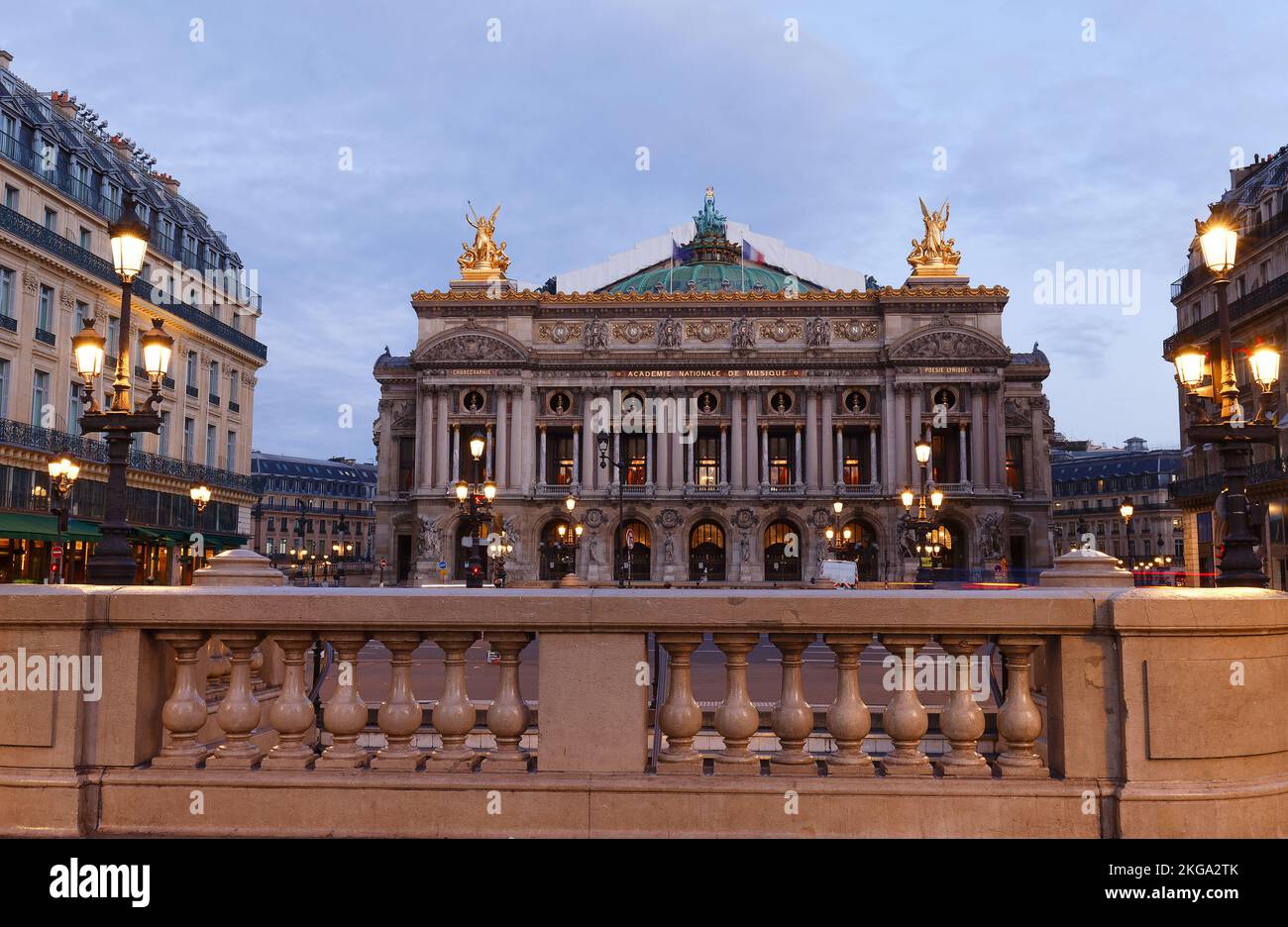 Night front view of the Opera National de Paris. Grand Opera is famous ...