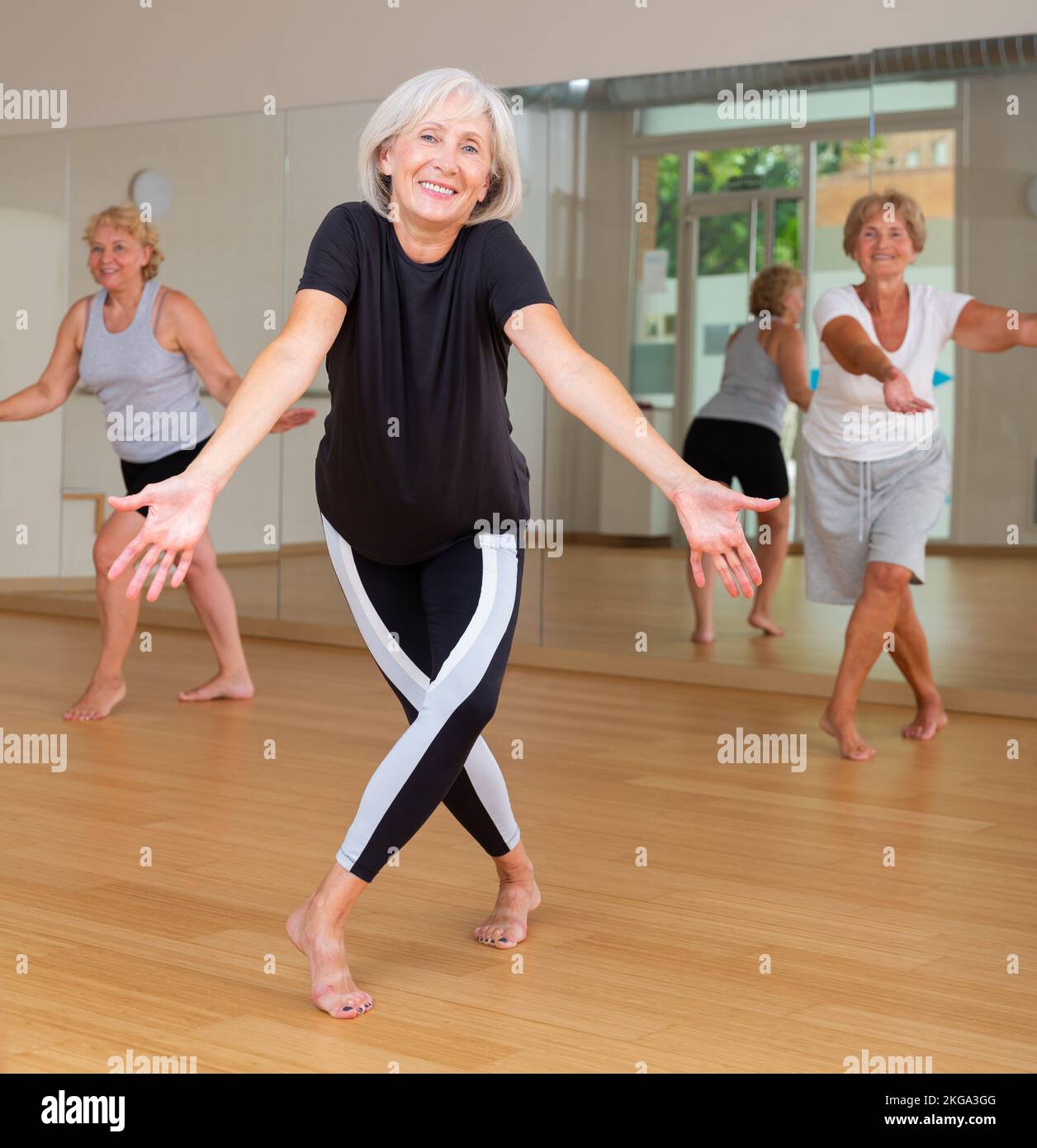 Happy 50s woman dance class hi-res stock photography and images - Alamy