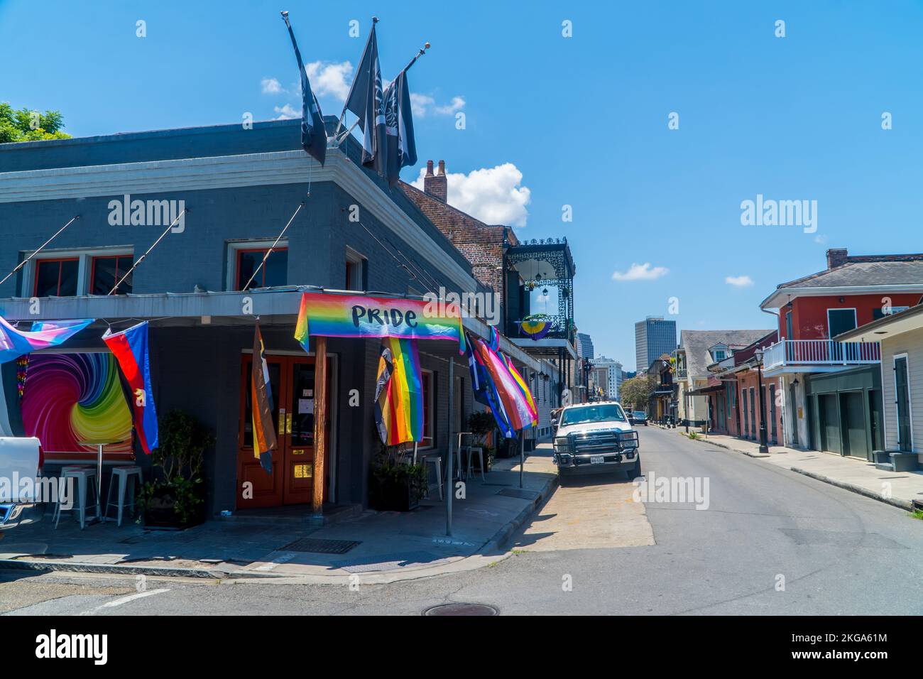 The French Quarter street in New Orleans with LGBTQ flags on the ...