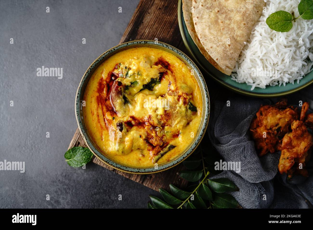 Homemade Punjabi Kadhi pakora served with rice and roti Stock Photo - Alamy