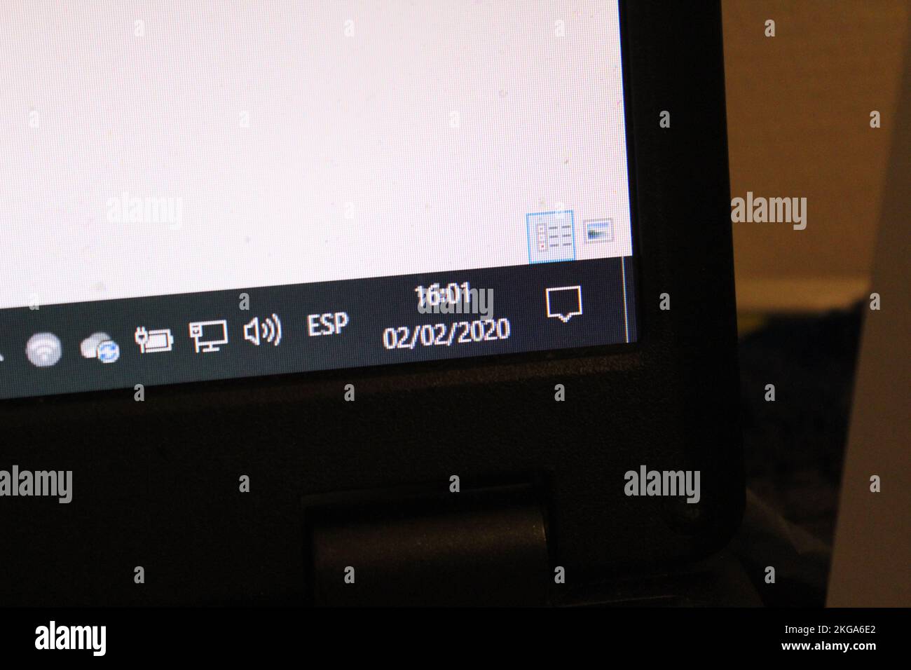 Toolbar with time and date in a computer screen Stock Photo - Alamy