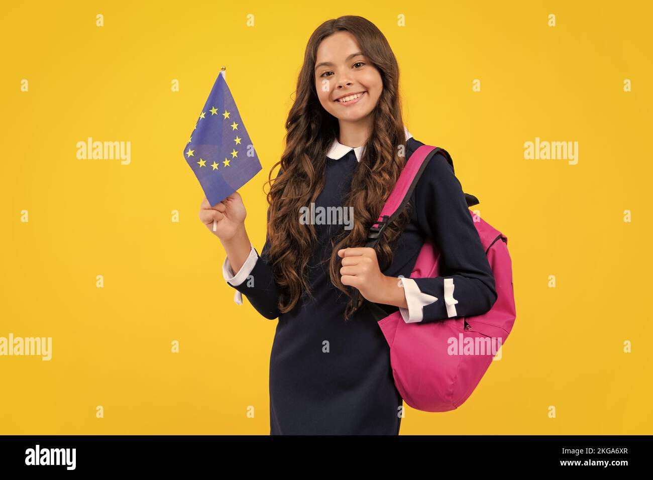 Teenage school student girl holding small flag with european union ...