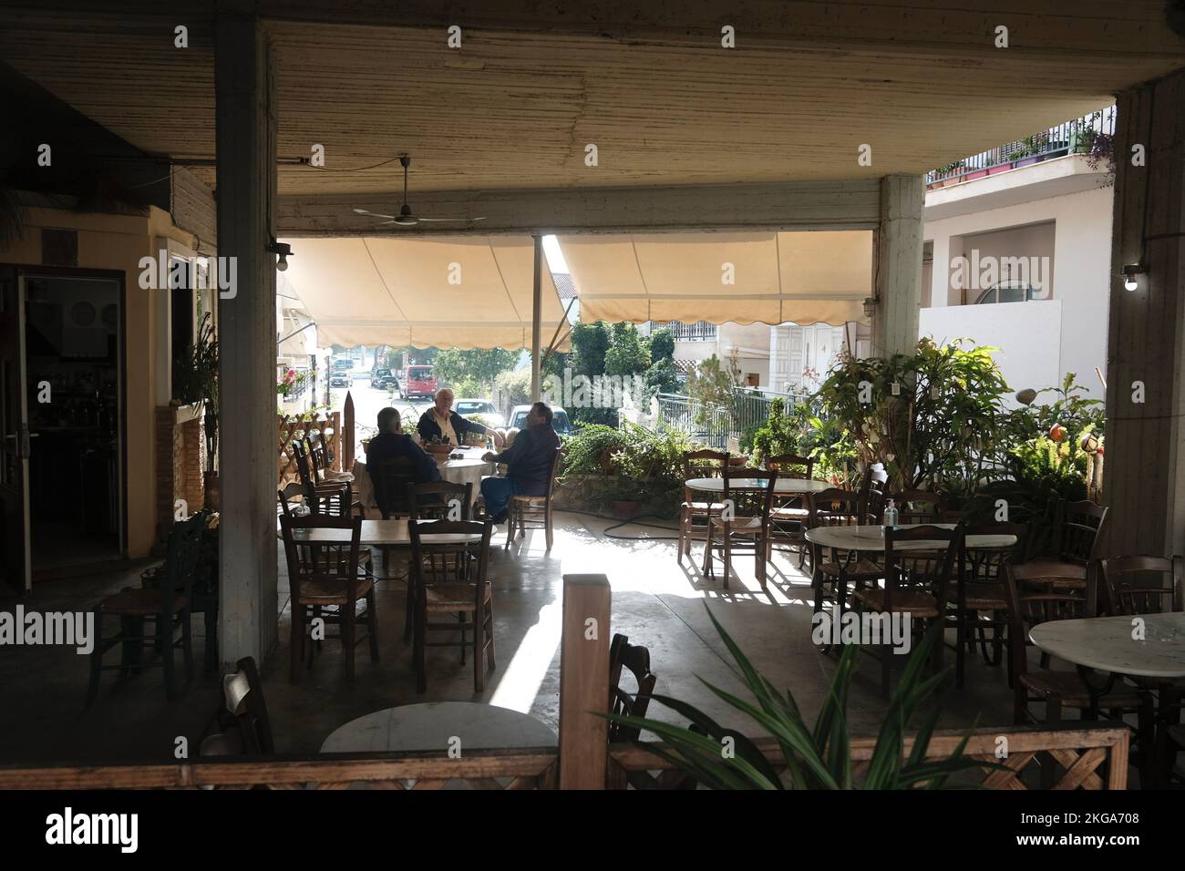 Old Greek men chatting in a cafe Stock Photo - Alamy