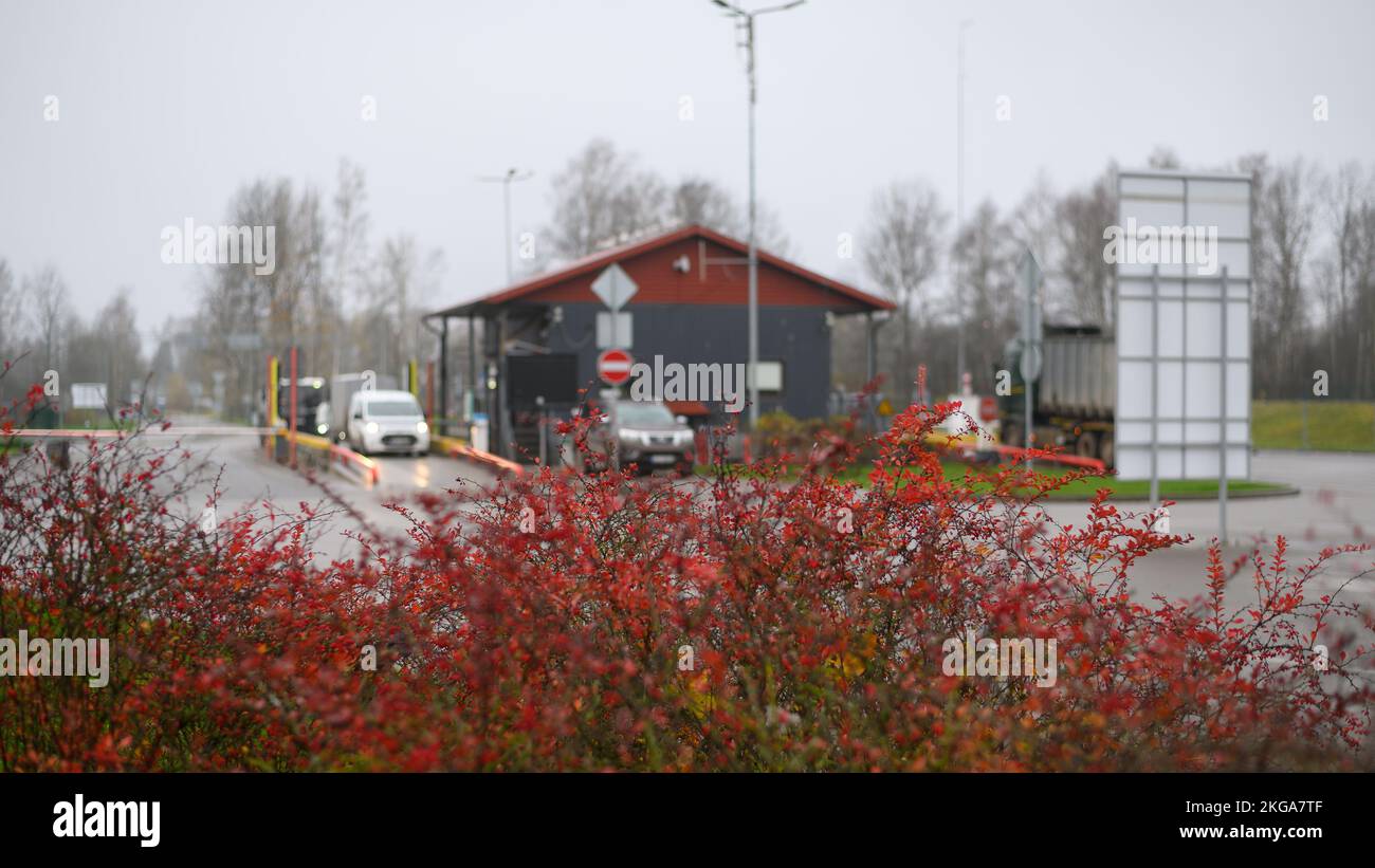 Cars waiting at control post to enter waste processing site ...