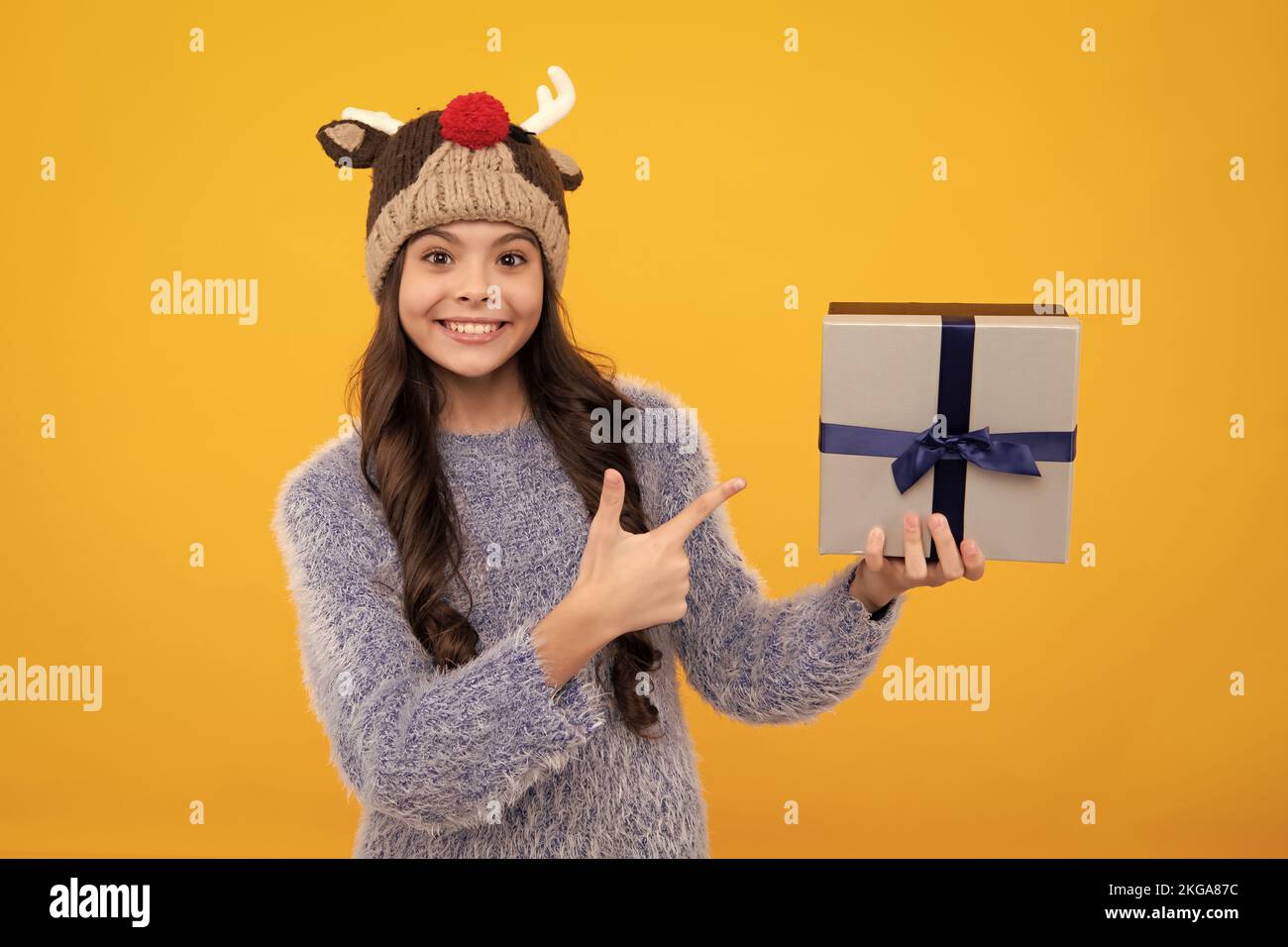 New Year or Christmas holiday gift. Happy teenager, positive and ...