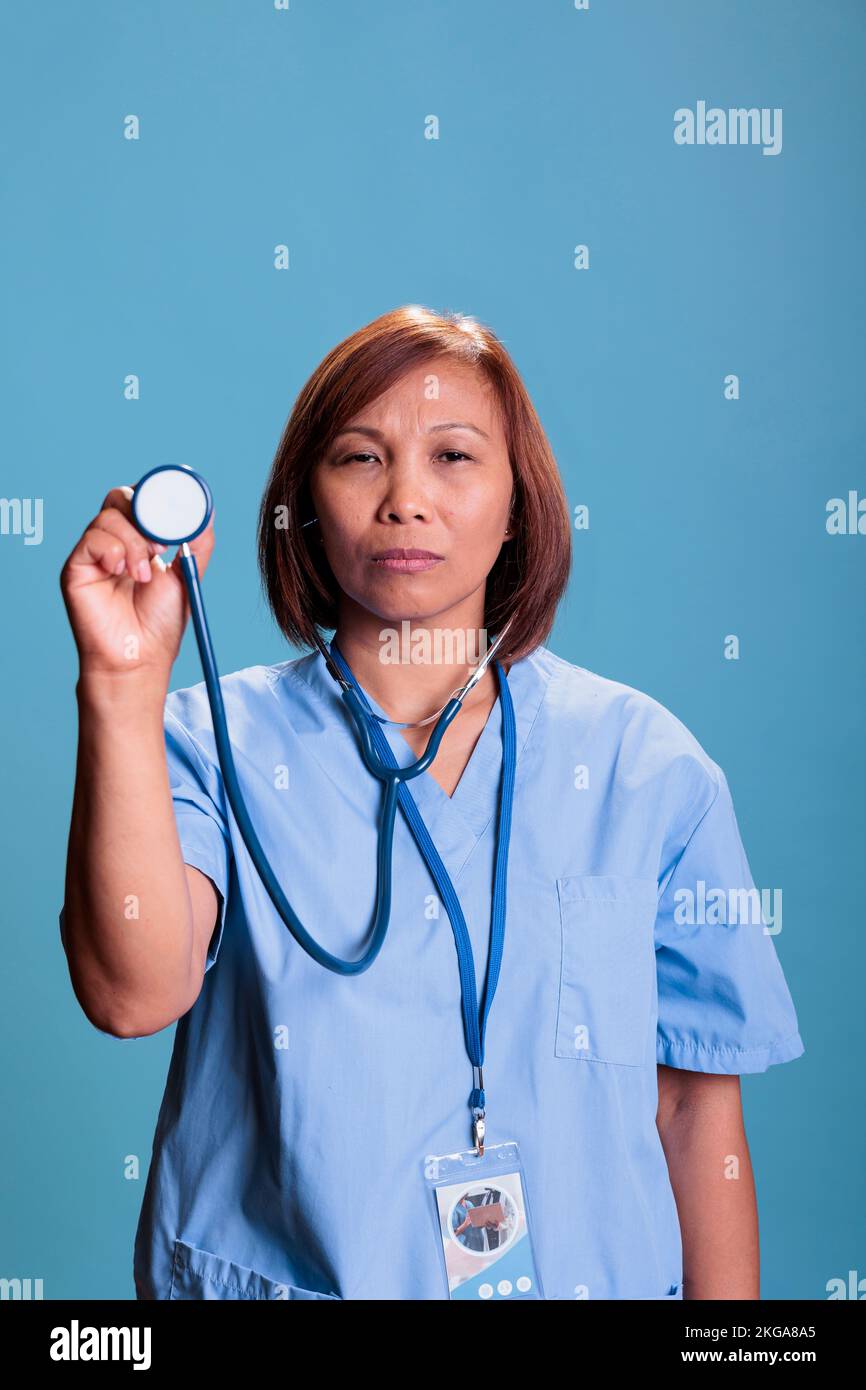 Asian blue scrubs hi-res stock photography and images - Alamy
