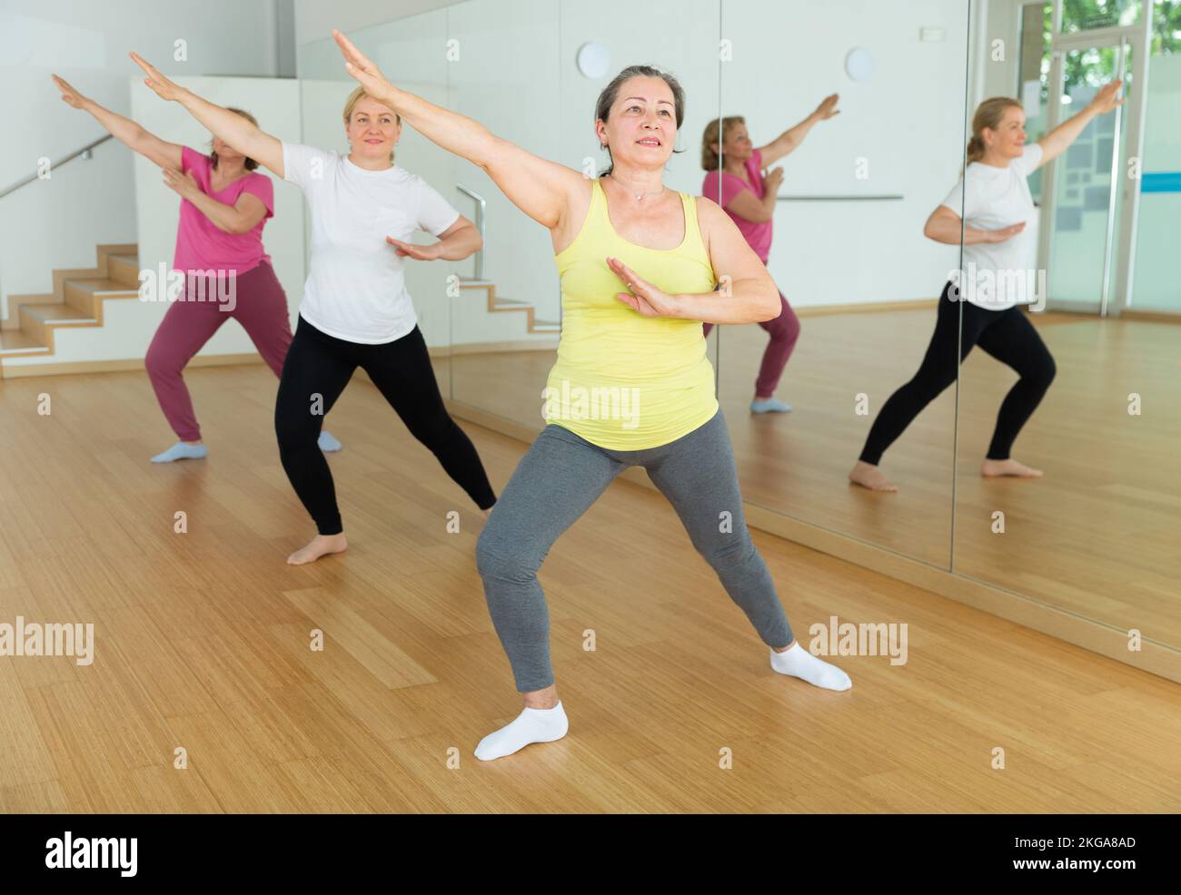 Adults training swing steps at dance class Stock Photo - Alamy