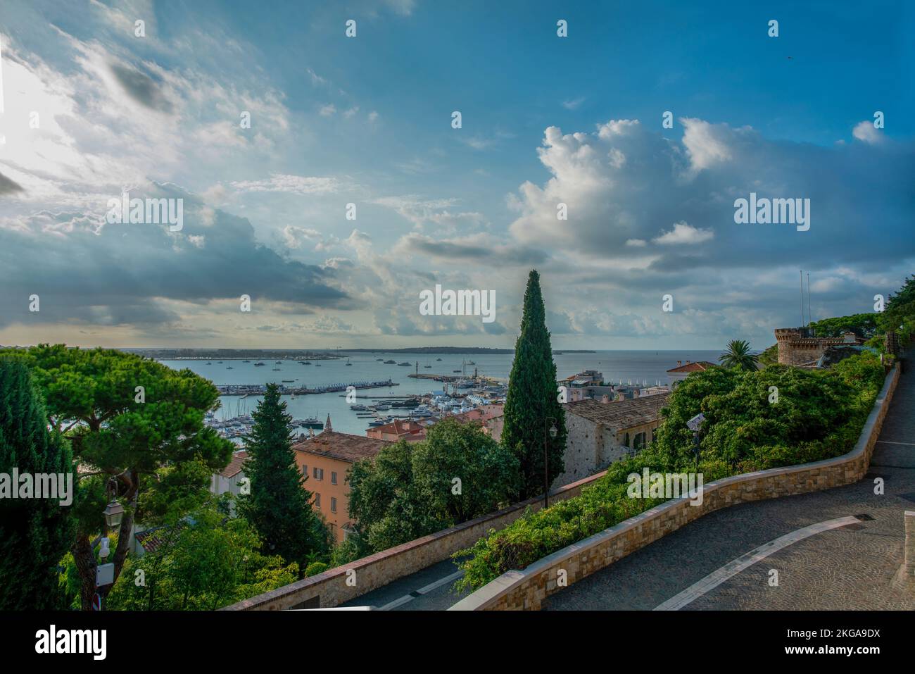 Aerial view of Cannes on bay with yachts and sailboats and lighthouse ...