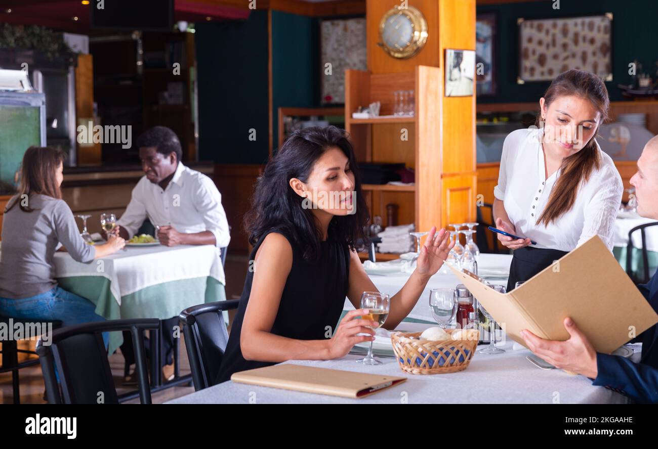 Asian woman ordering in restaurant hi-res stock photography and images ...