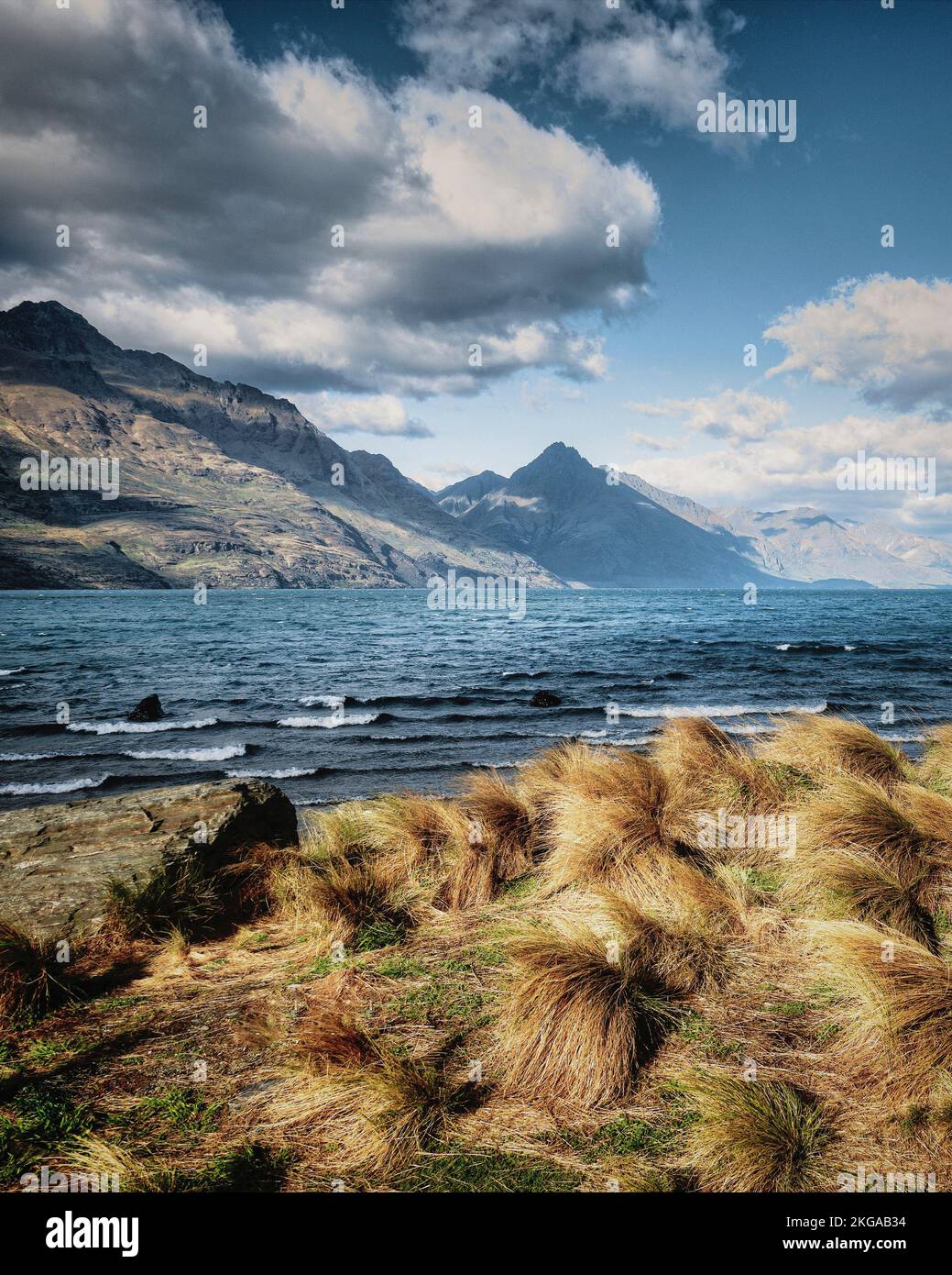 Wind sweeps across Lake Wakatipu near Queenstown creating whitecaps ...