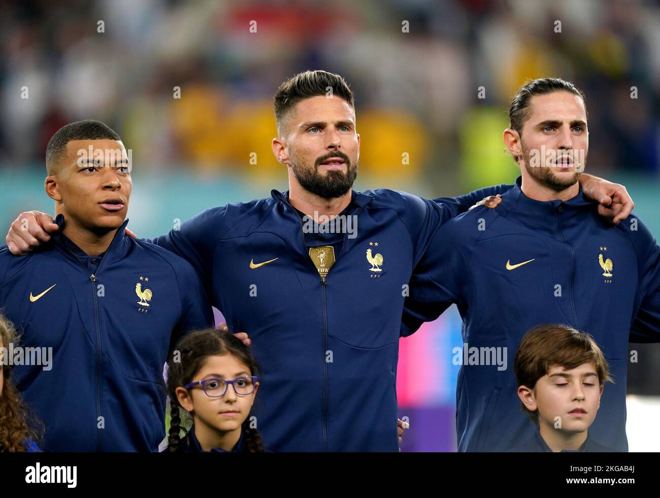 France's Kylian Mbappe (left), Olivier Giroud and Adrien Rabiot line up ...