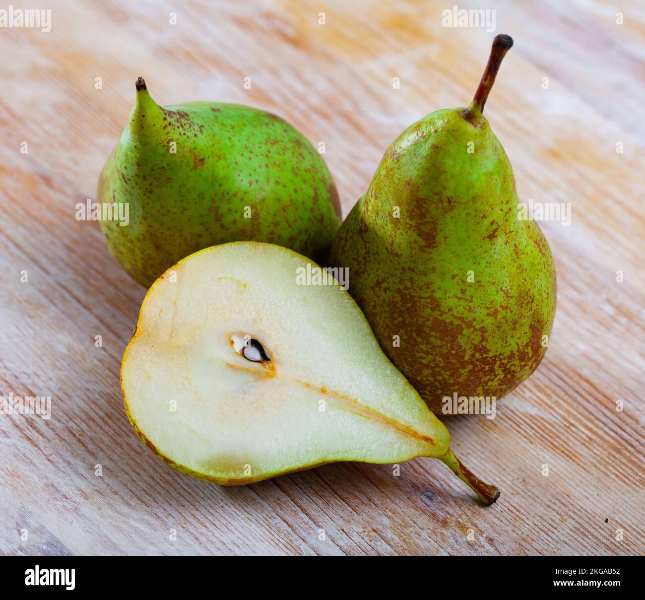 Many tasty pears on wooden surface Stock Photo - Alamy