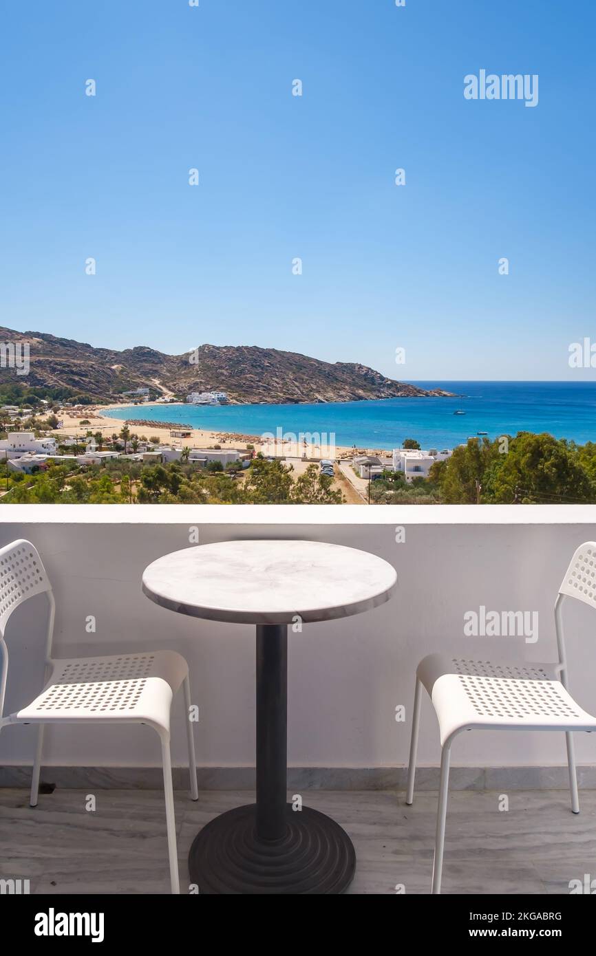 Amazing view from a balcony with chairs and a table overlooking the ...