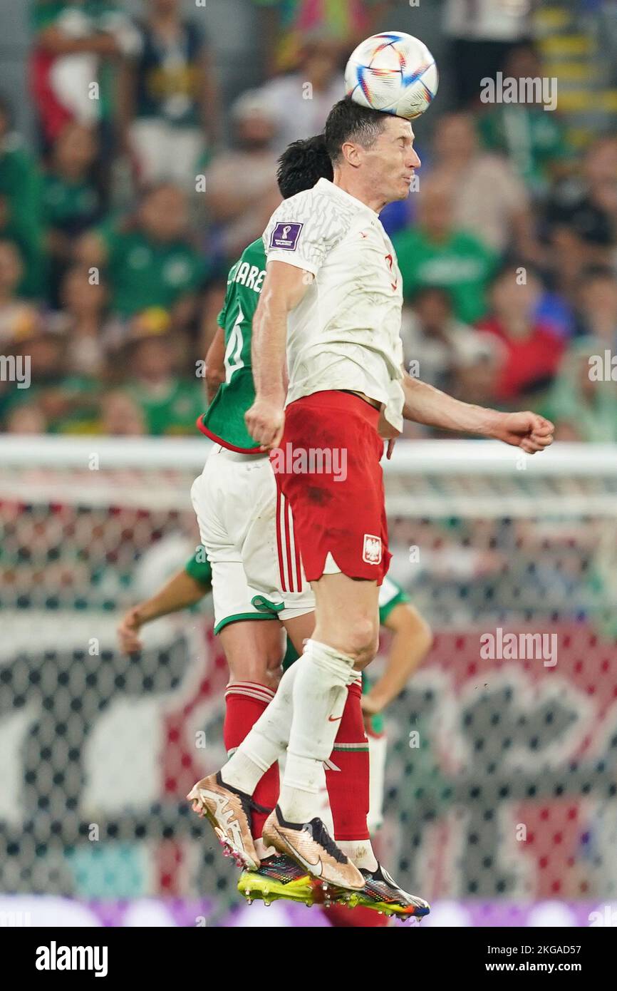 DOHA, QATAR - NOVEMBER 22: Player of Poland Robert Lewandowski heads ...
