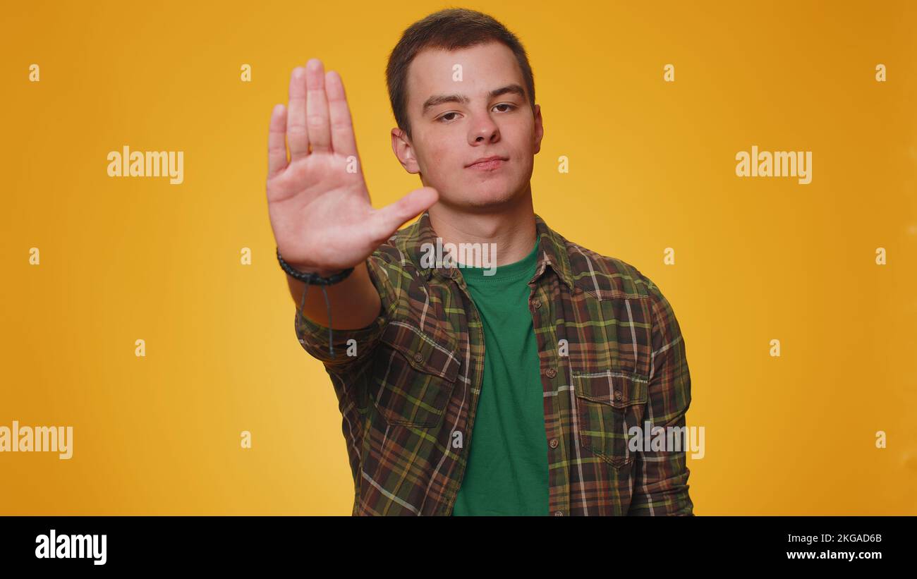 No stop. Serious adult man say No, hold palm folded crossed hands in ...