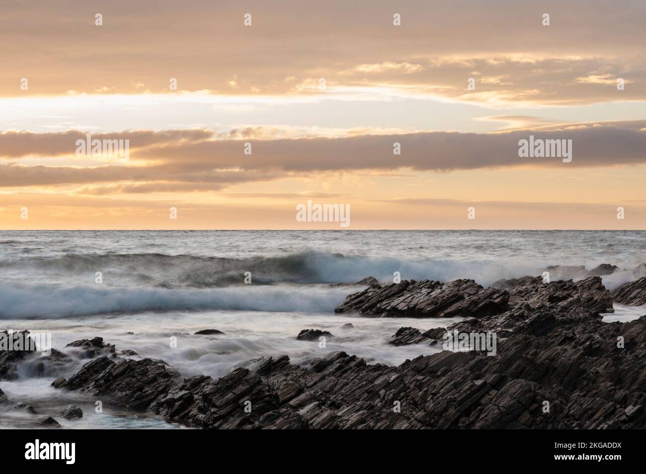 Waves break over the jagged rocks at Second Valley, South Australia ...