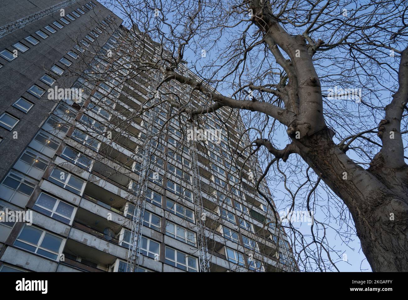 Run down abandoned social housing tower block awaiting re-development ...
