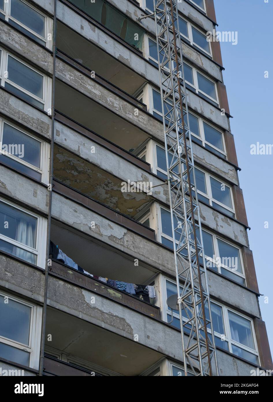 Run down abandoned social housing tower block awaiting re-development ...