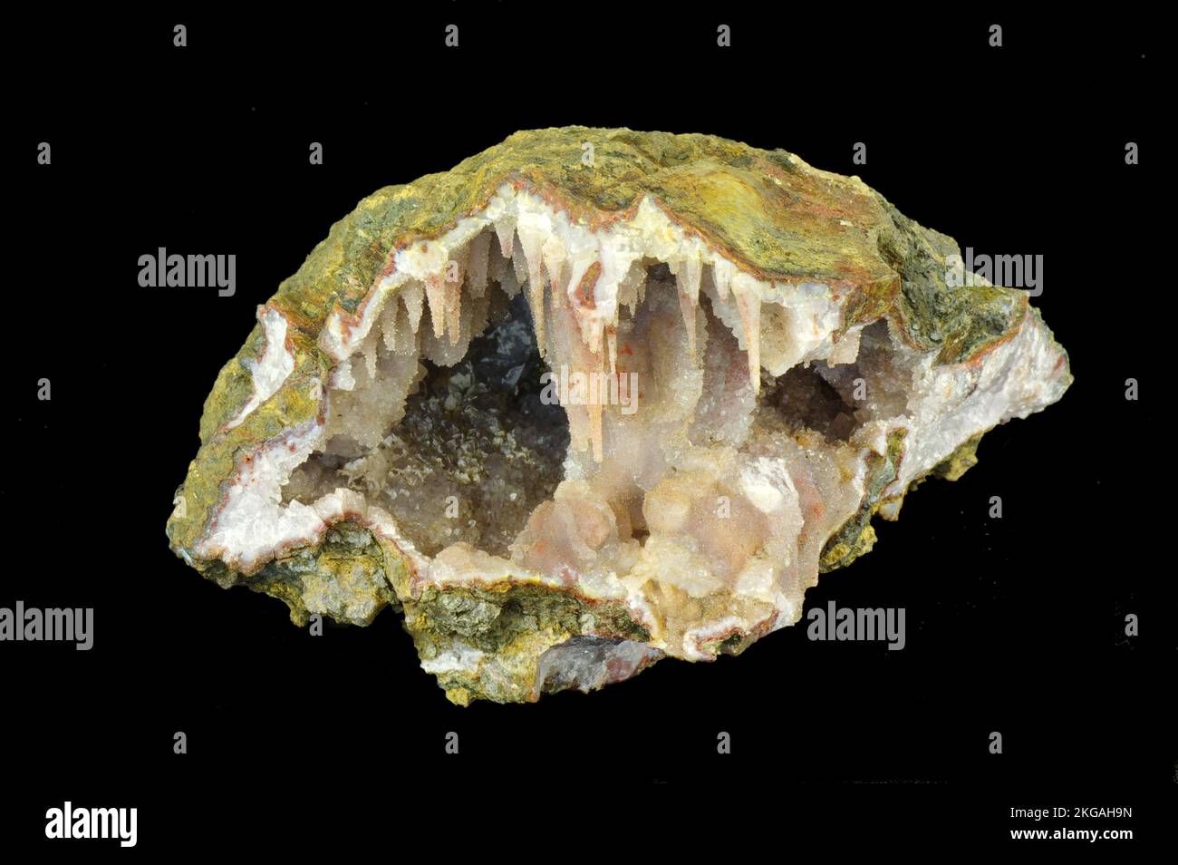 Quartz geode with chalcedony stalactite forms covered with quartz ...