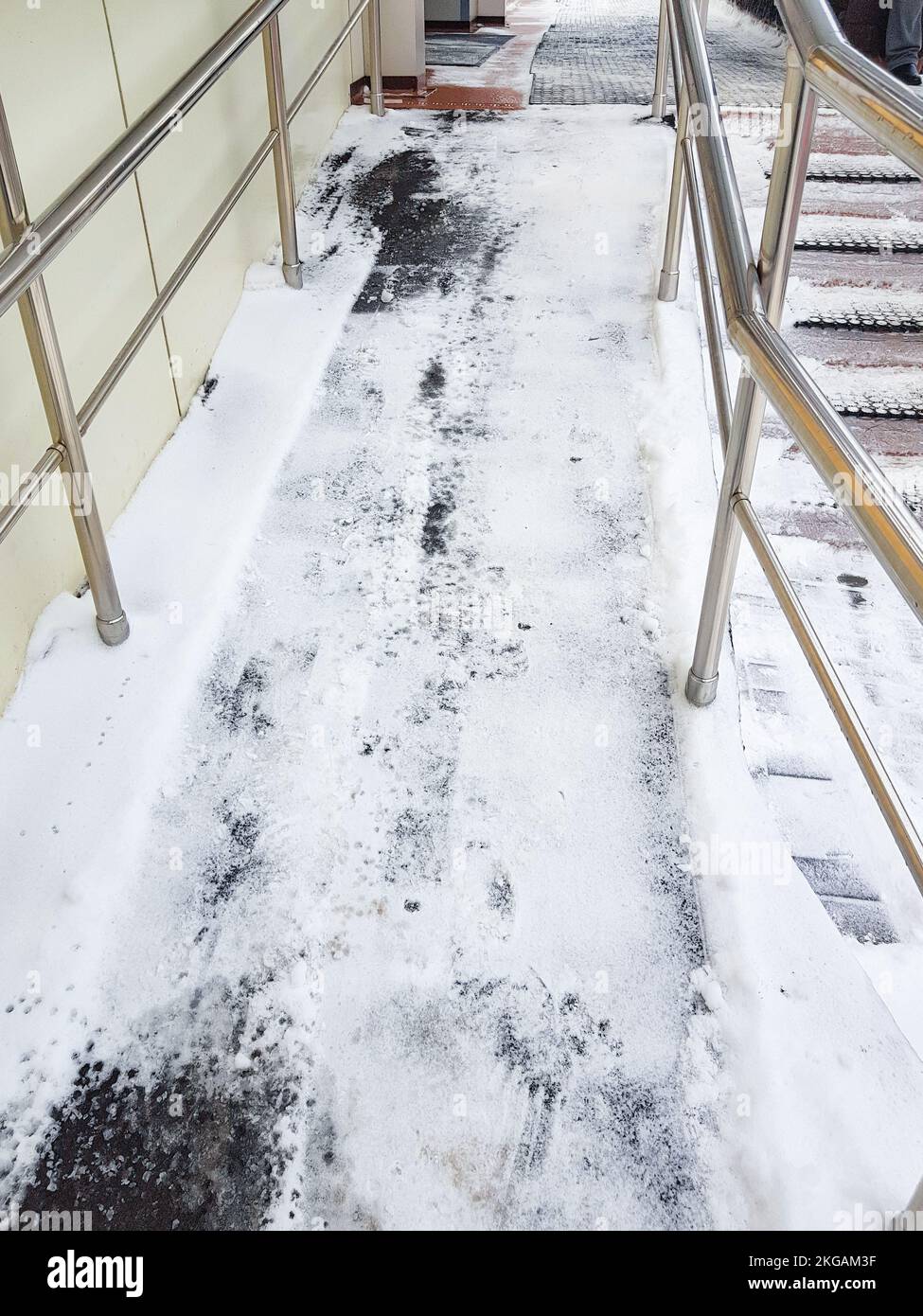 Modern ramp with metal railings for accessible movement of people with ...