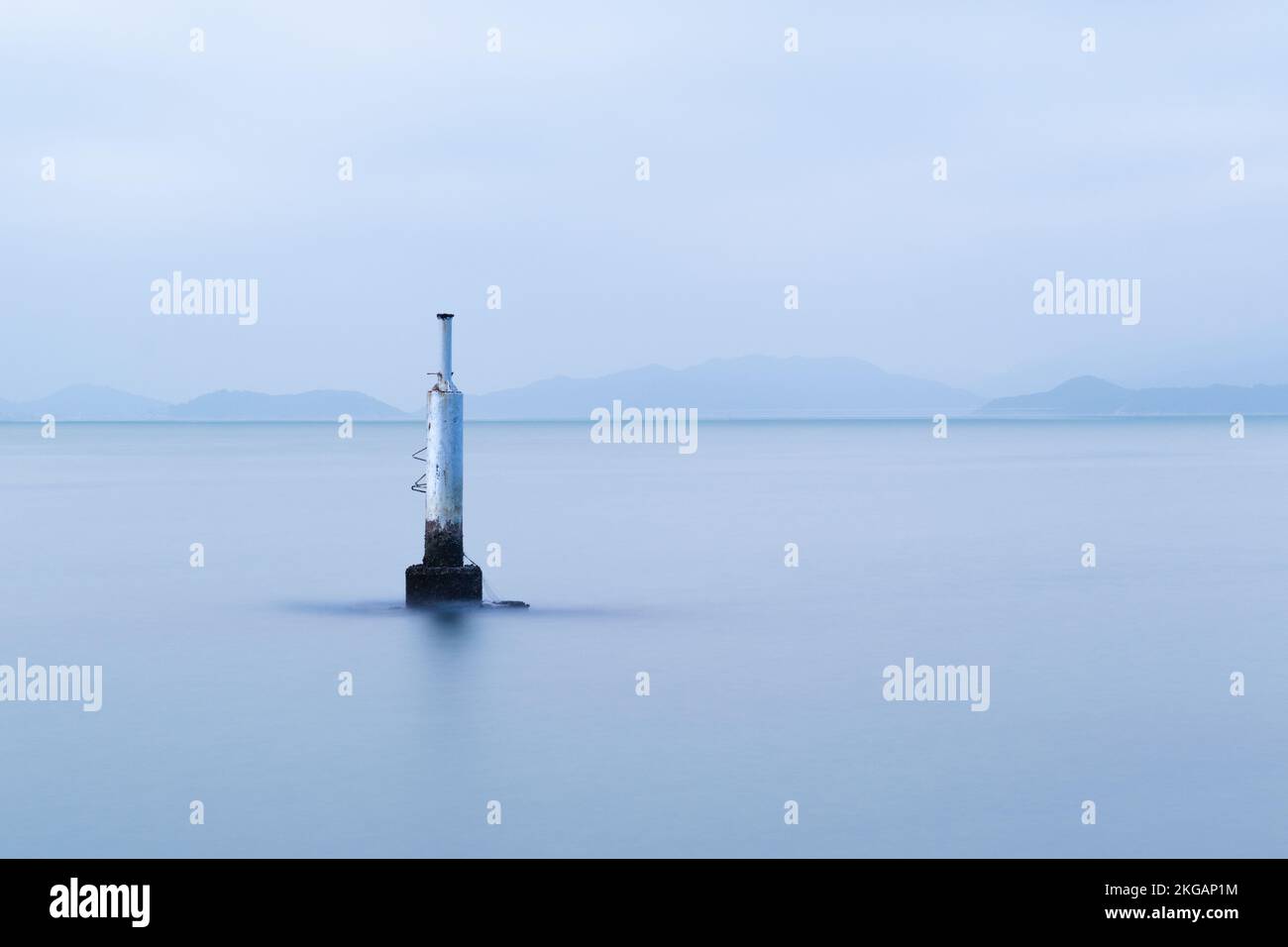 Concrete post in the sea probably for mooring or navigation. Long ...