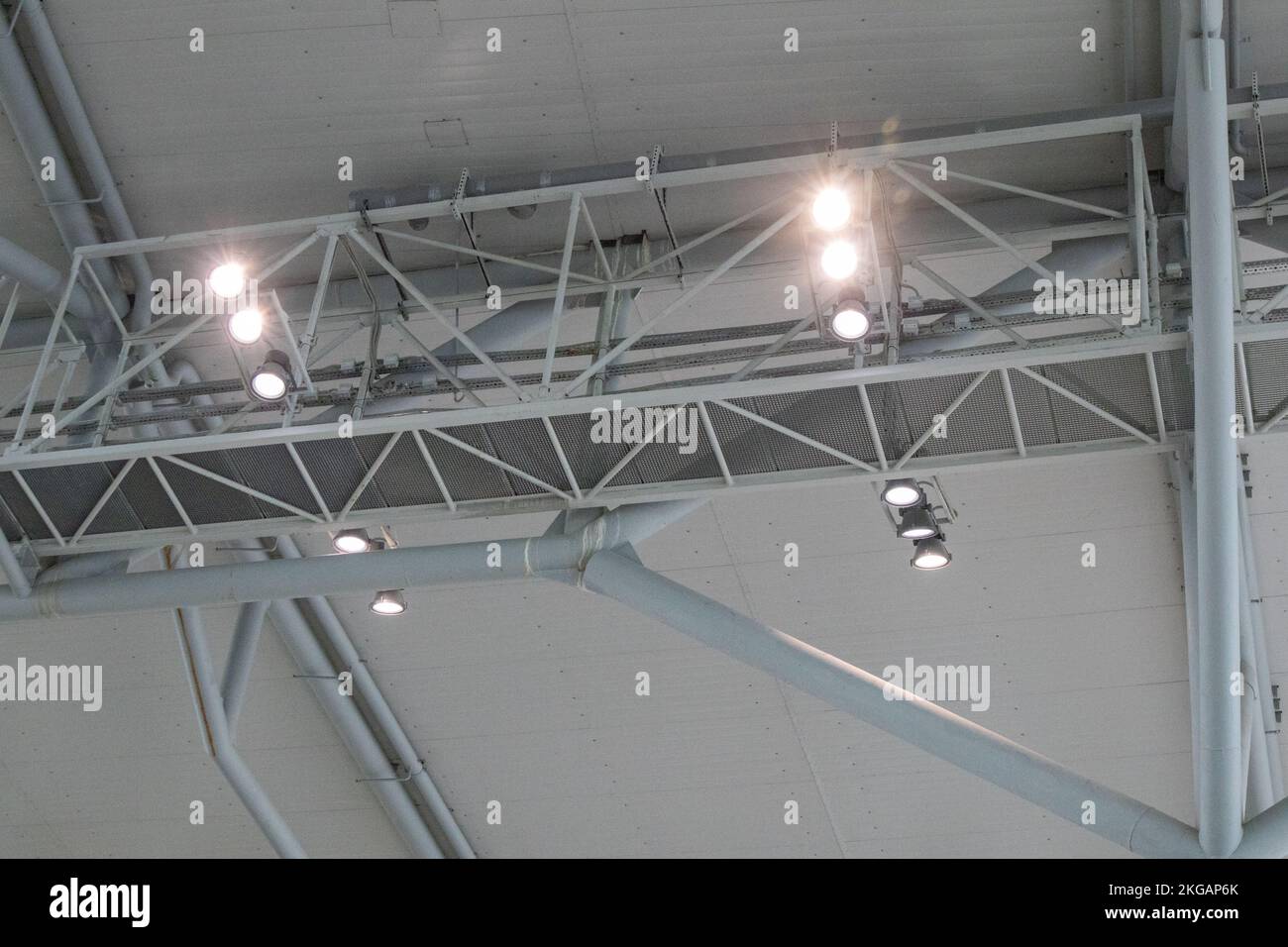 Ceiling with bright lighting in a modern warehouse, shopping center ...