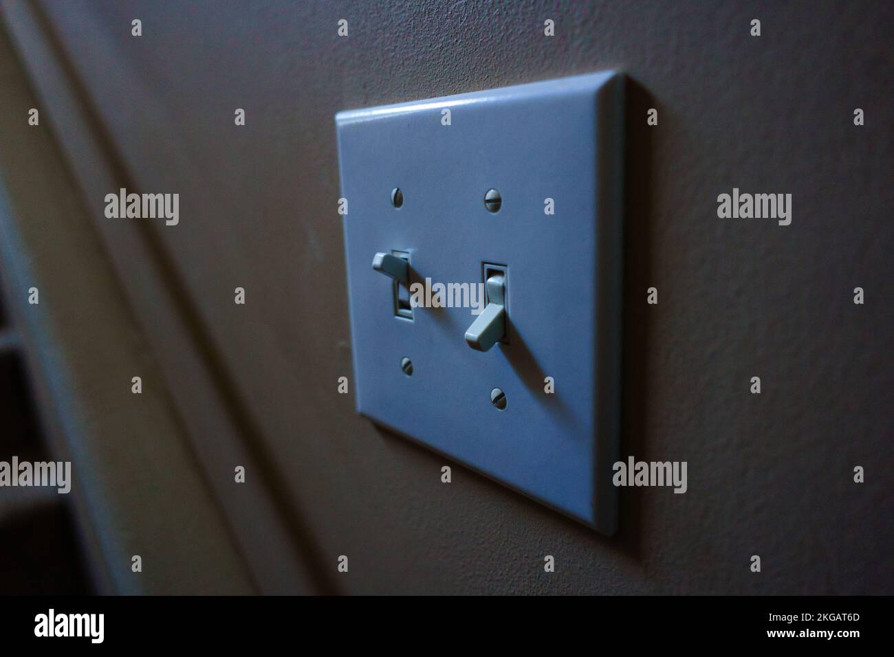 Light switch downstairs one on one off Stock Photo - Alamy