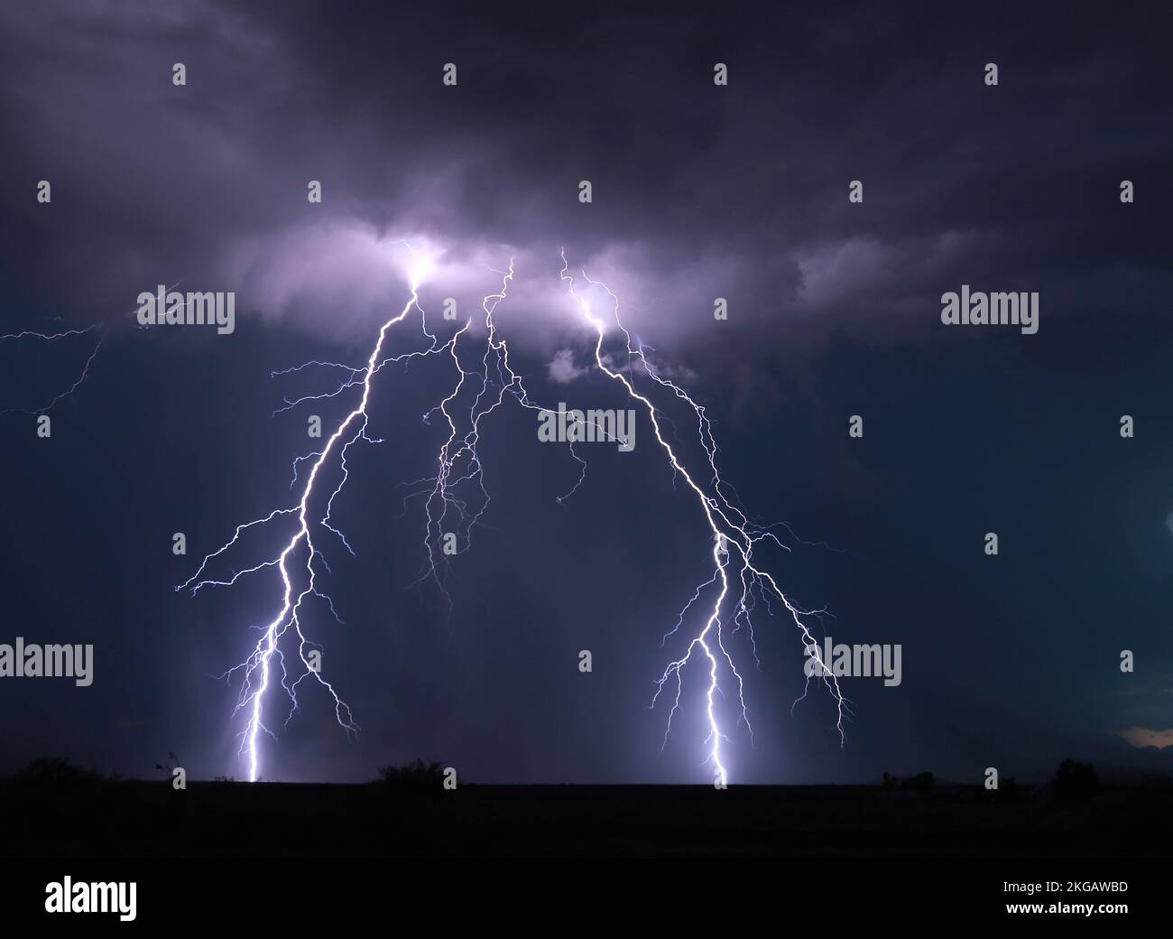 Intense lightning strike from a monsoon thunderstorm near Tucson ...