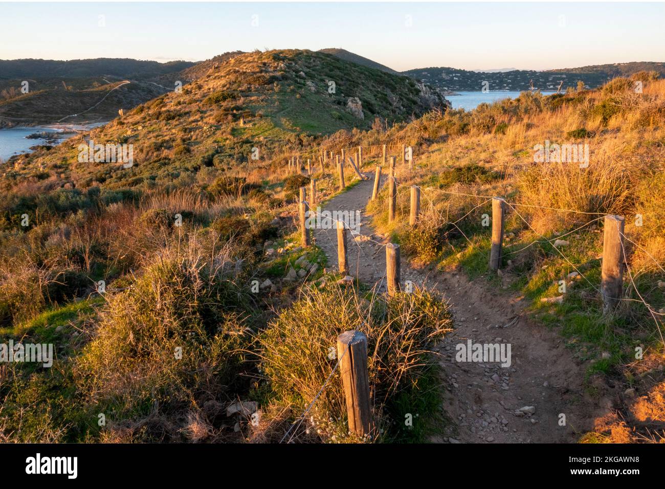 Mud path borded with wooden pillat Cape Taillat, in Ramatuelle, French ...