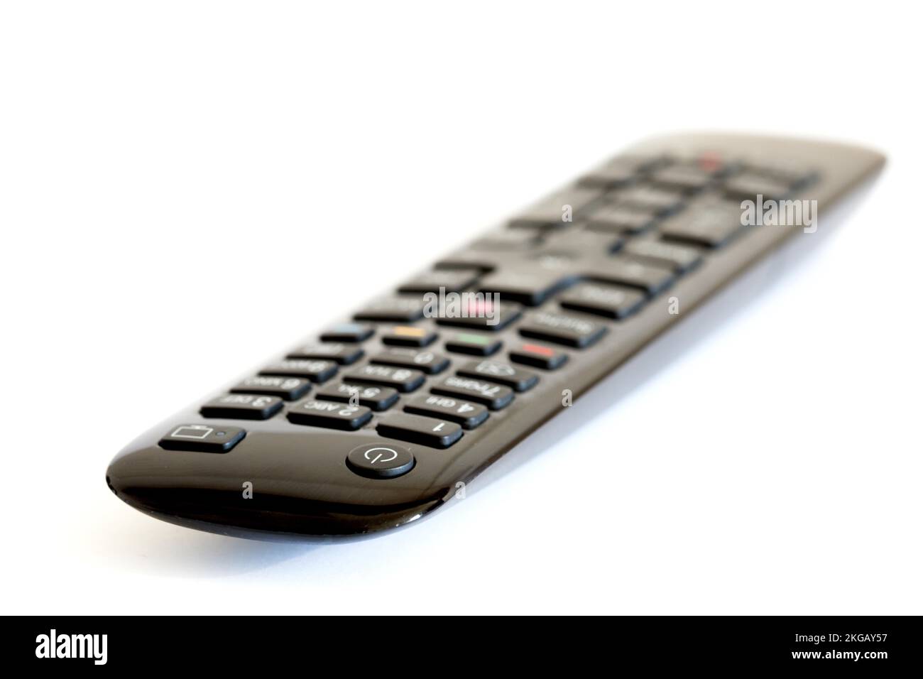 Black remote control for a TV and TV with a focus gradient Stock Photo ...