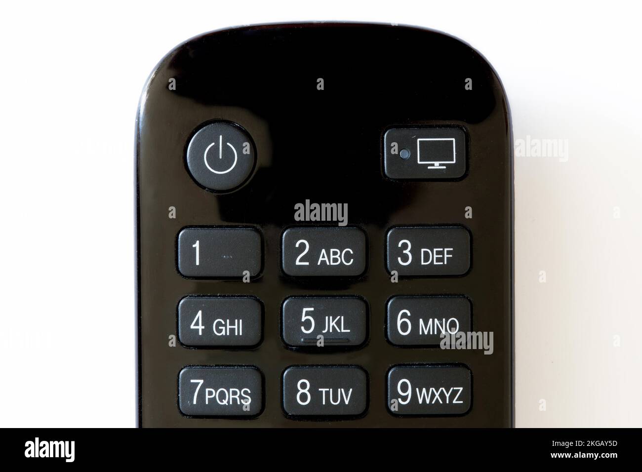 Keyboard from a remote control for TV and TV Stock Photo - Alamy