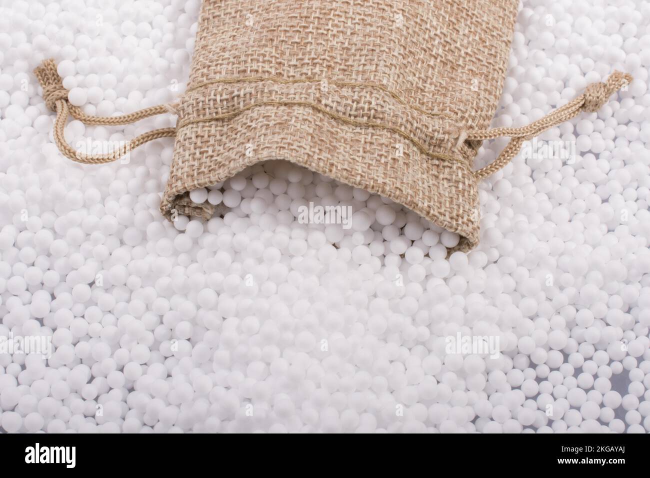 Little sack in White polystyrene foam balls as background Stock Photo ...