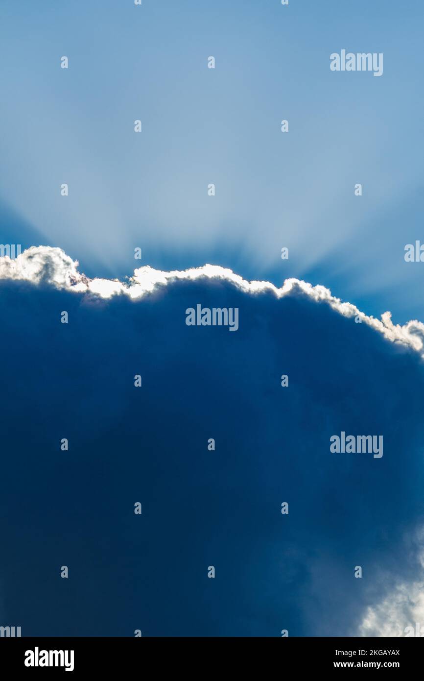 Grey color clouds partly cover the sky in the daytime Stock Photo - Alamy