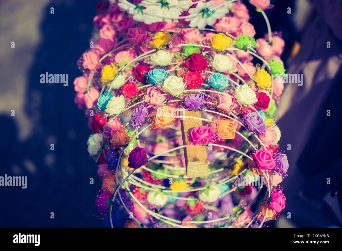 Head crown made of beautiful fake flowers wreath Stock Photo - Alamy